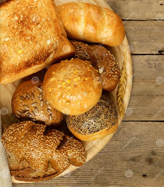 Different Bread (rye Bread, White Loaf, Bun) Stock Image - Image of ...