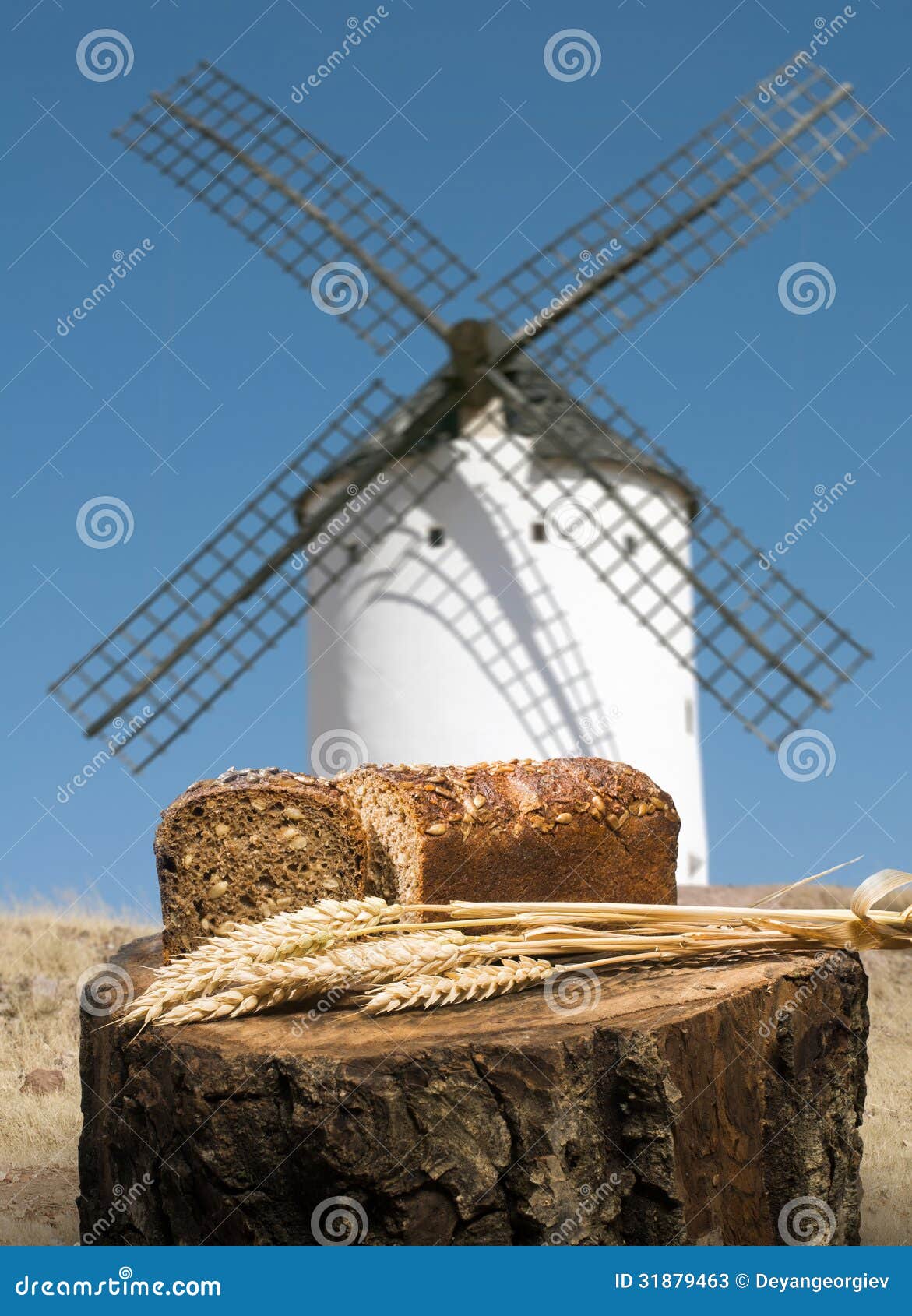 Different Breads and Windmill in the Background Stock Image - Image of ...
