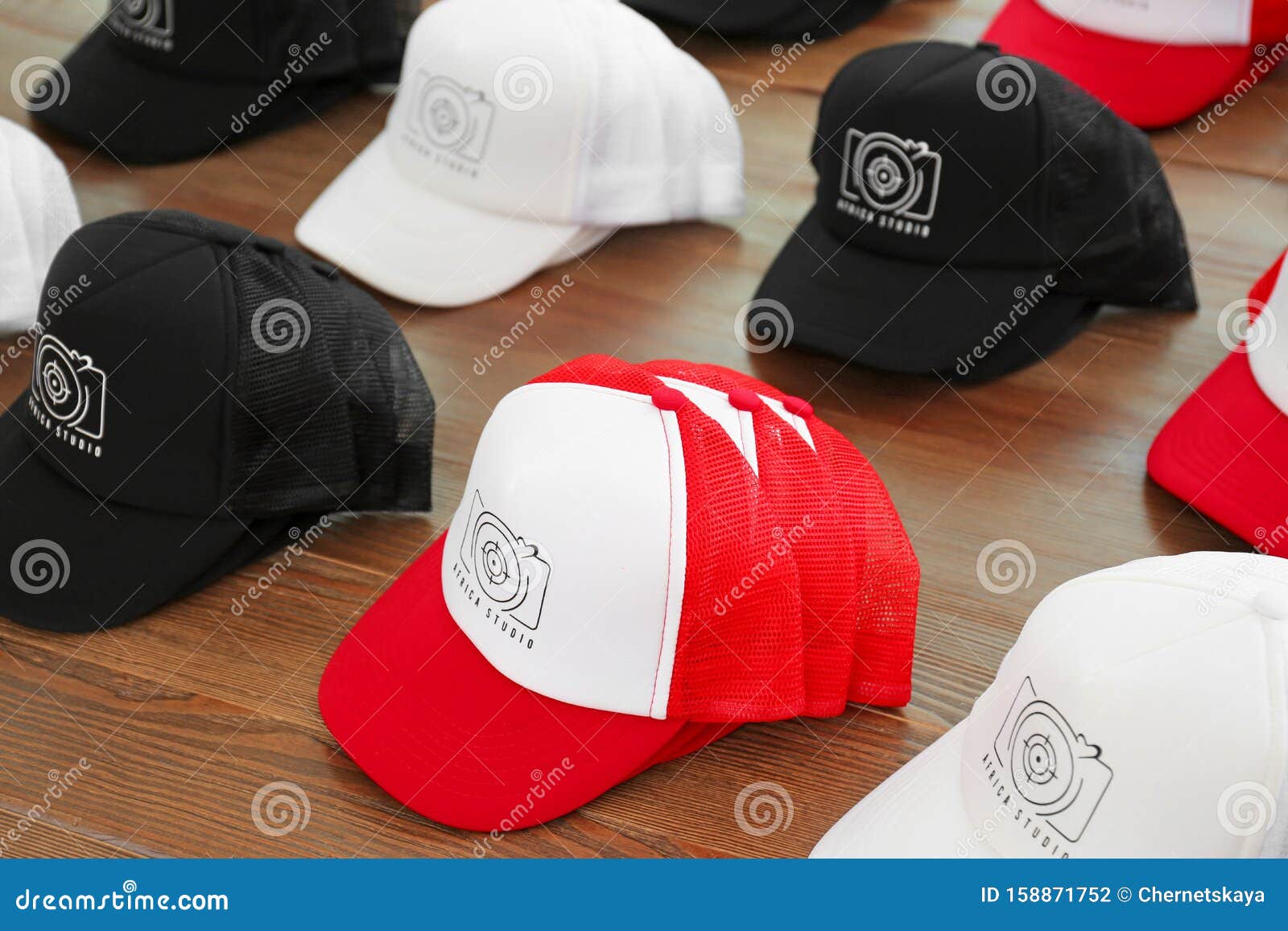 Different Caps With Logo On Wooden Shelf Editorial Photo ...