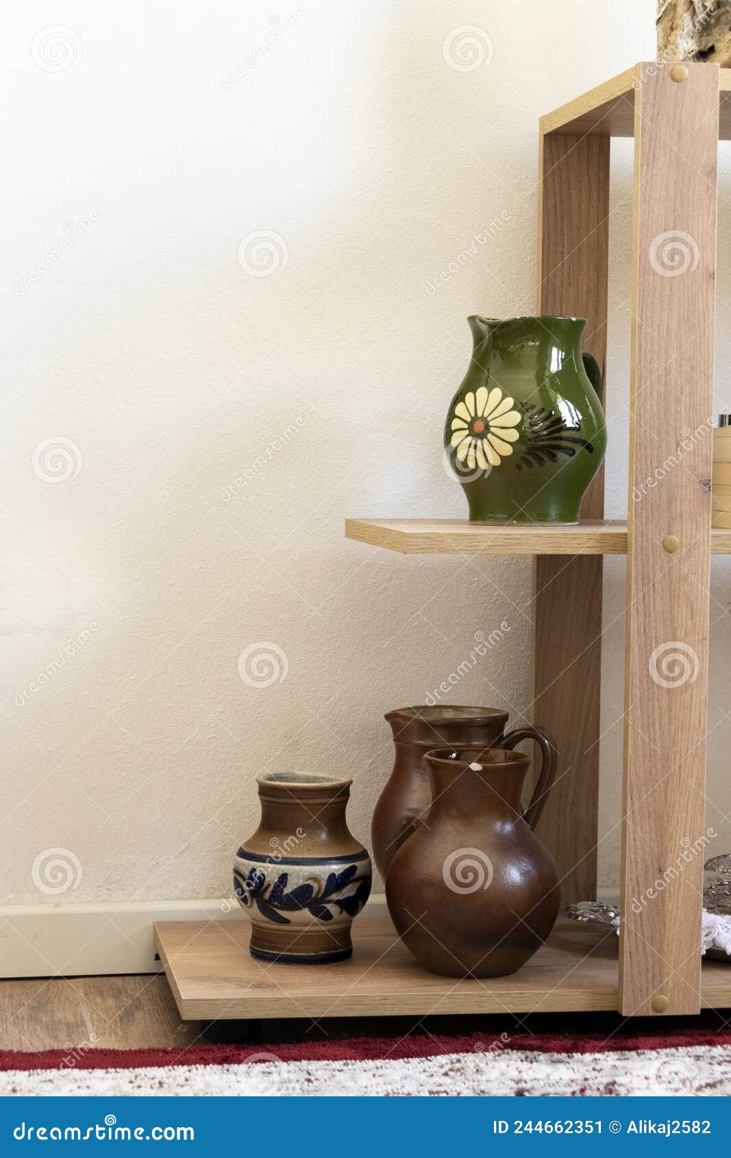Different Ceramic Pottery Vases on Shelves, Interior Design Stock Image ...