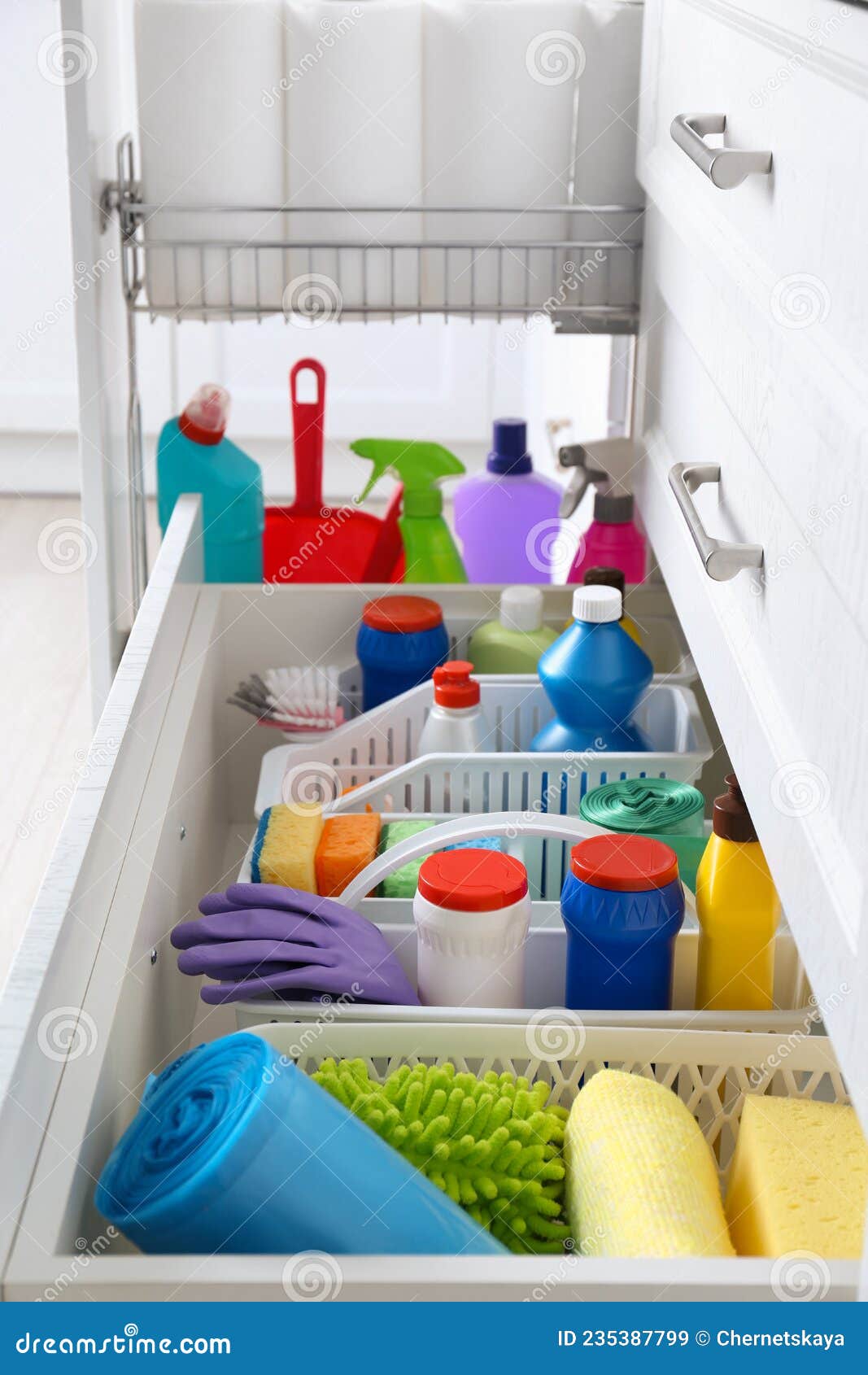 Different Cleaning Supplies in Open Drawers Indoors Stock Image - Image ...