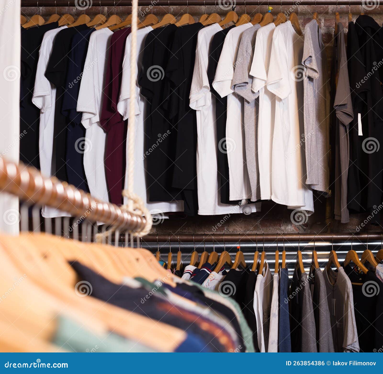 Different Clothes in the Modern Boutique Stock Photo - Image of shirt ...