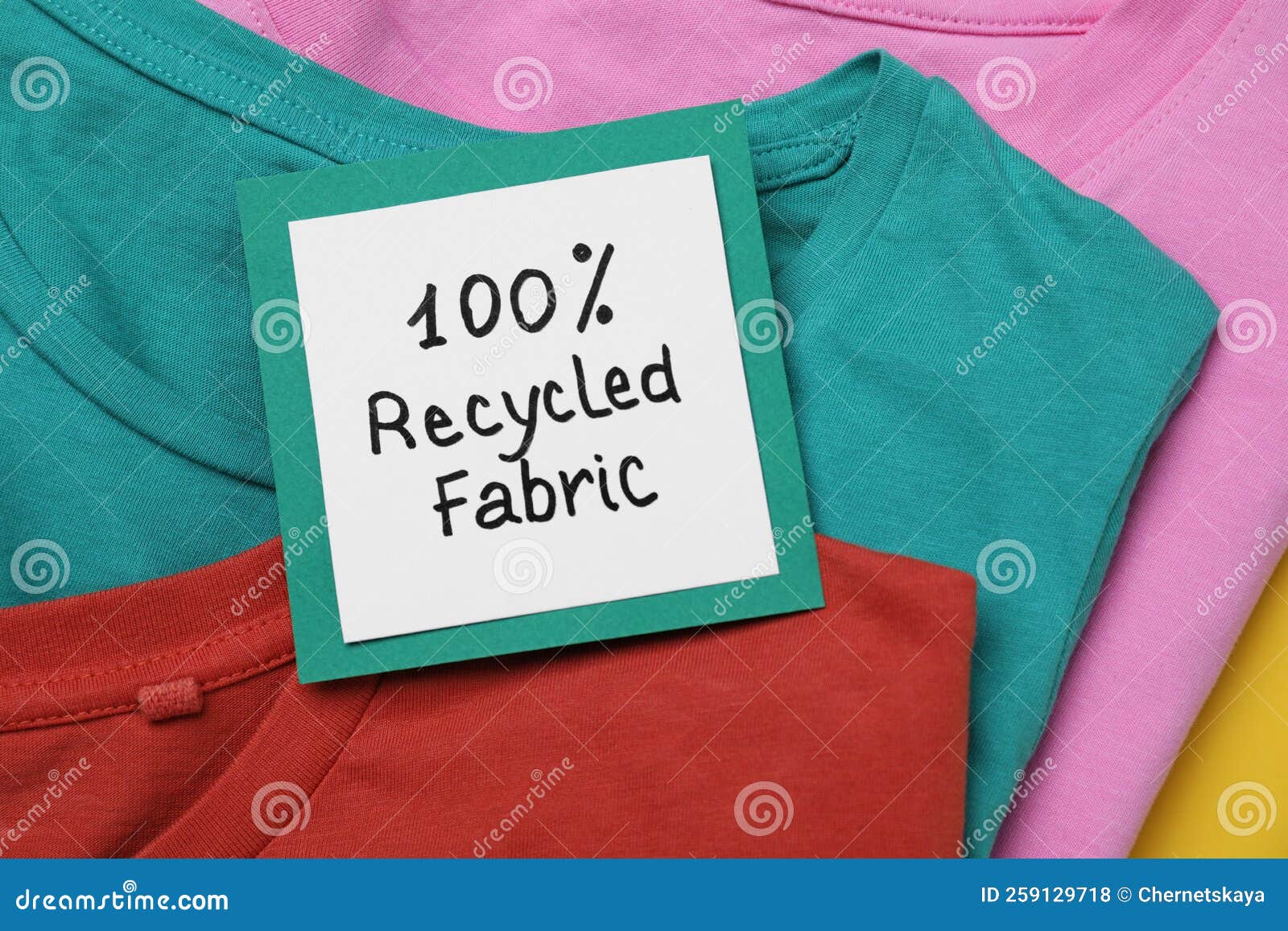 Different Clothes with Recycling Label, Closeup View Stock Photo ...