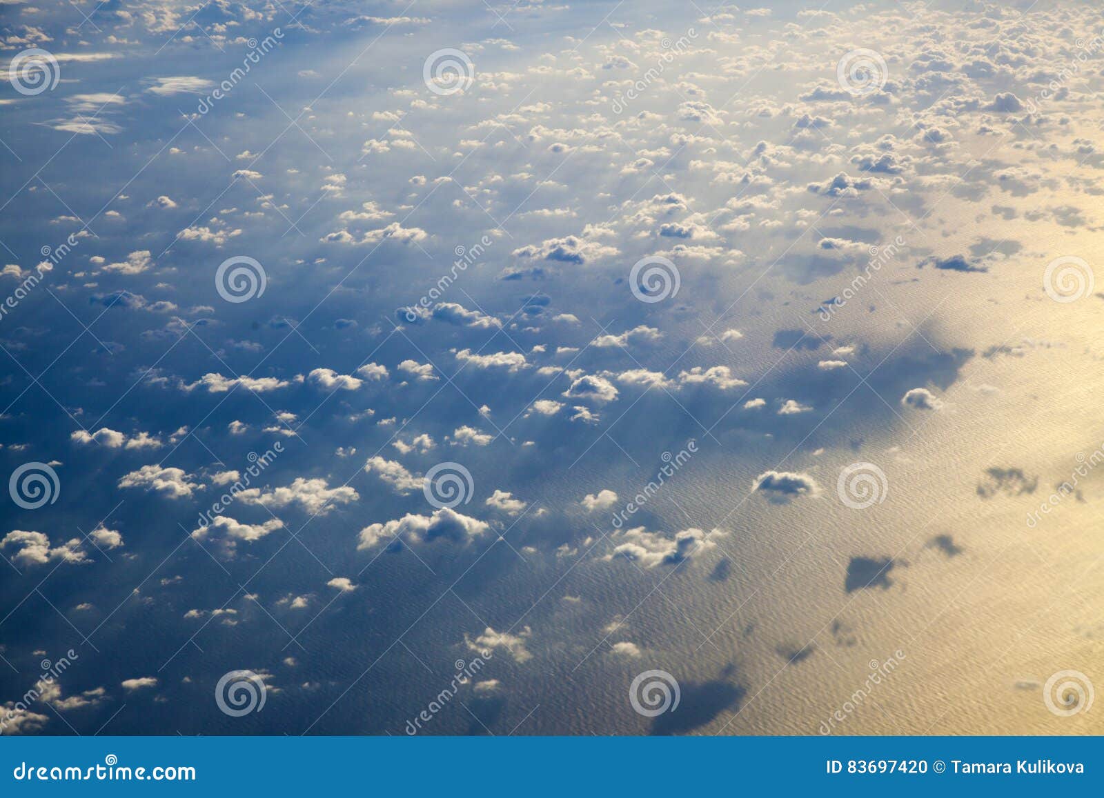 Different Clouds Below, View from a Plane Stock Photo - Image of clouds ...