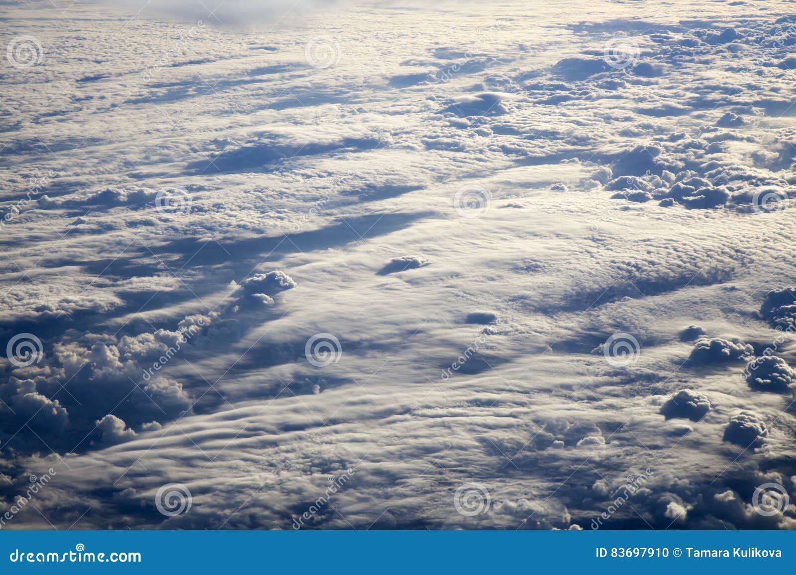 Different Clouds Below, View from a Plane Stock Photo - Image of type ...