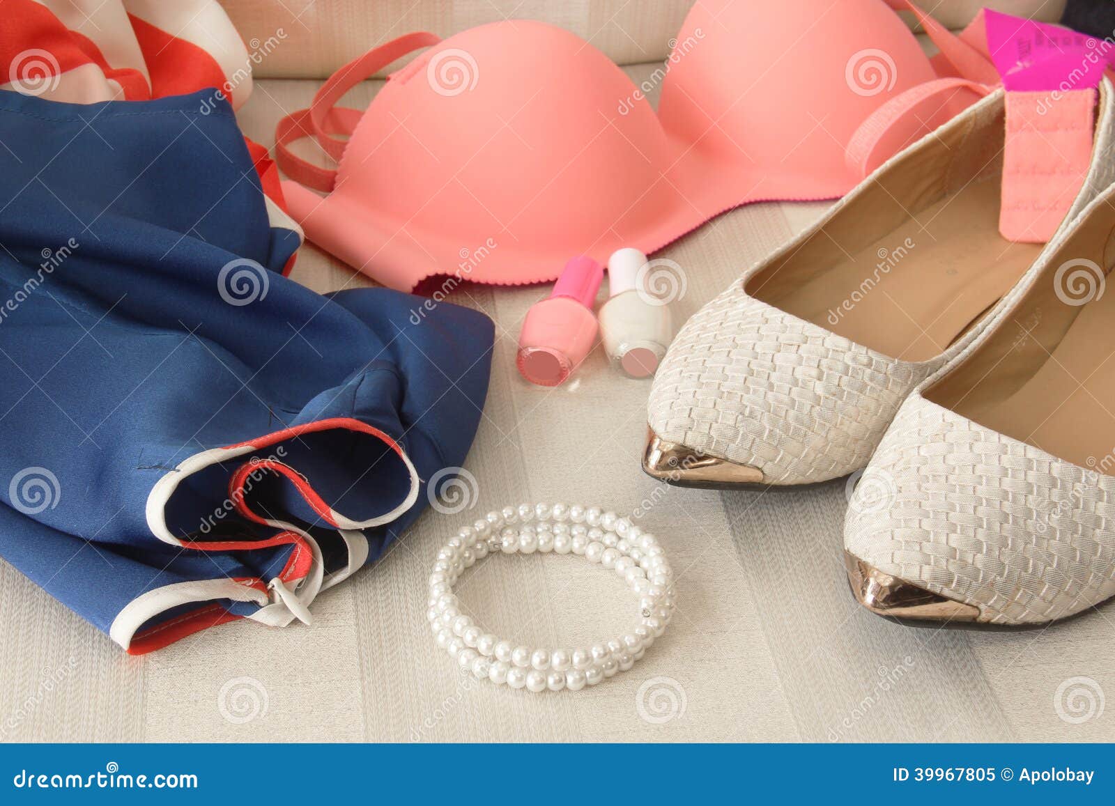 Different Collection of Clothes on the Couch Stock Image - Image of ...