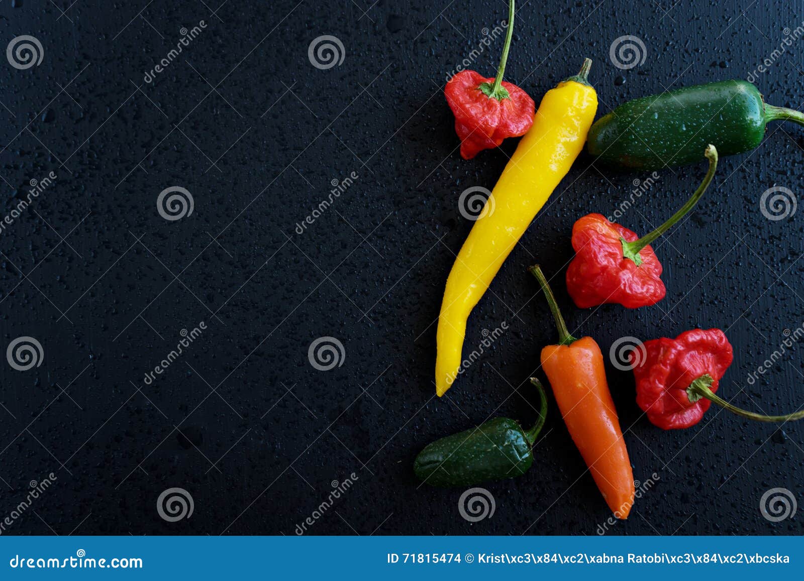 Different Color Chili Peppers on Black Background Stock Photo - Image ...
