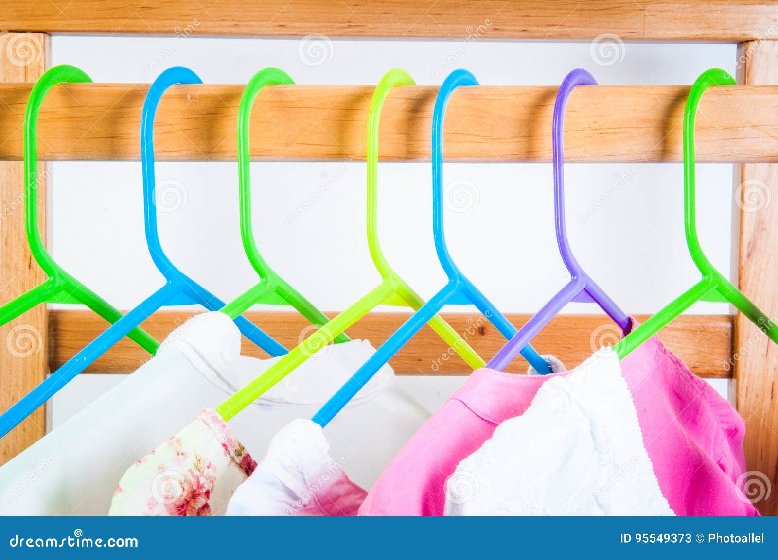 Different Color Clothes T-shirts on the Rack Stock Image - Image of ...