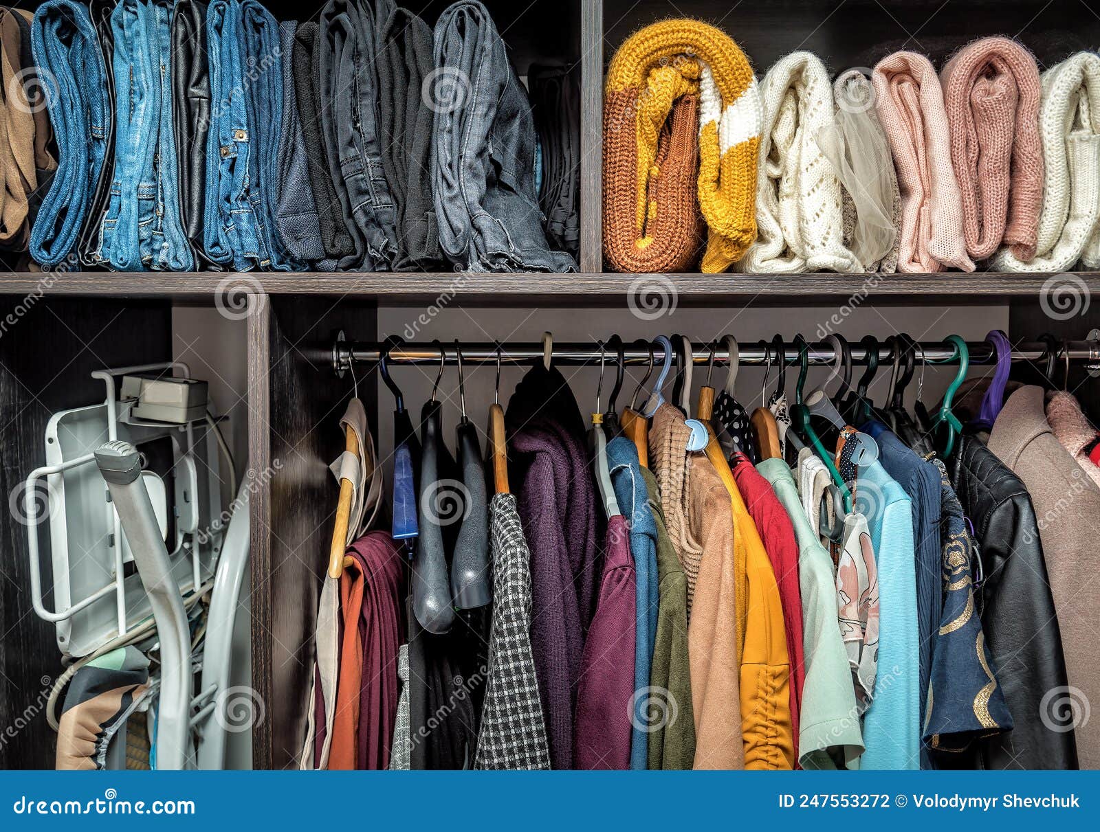 Different Color of Clothes in the Wardrobe Stock Photo - Image of ...