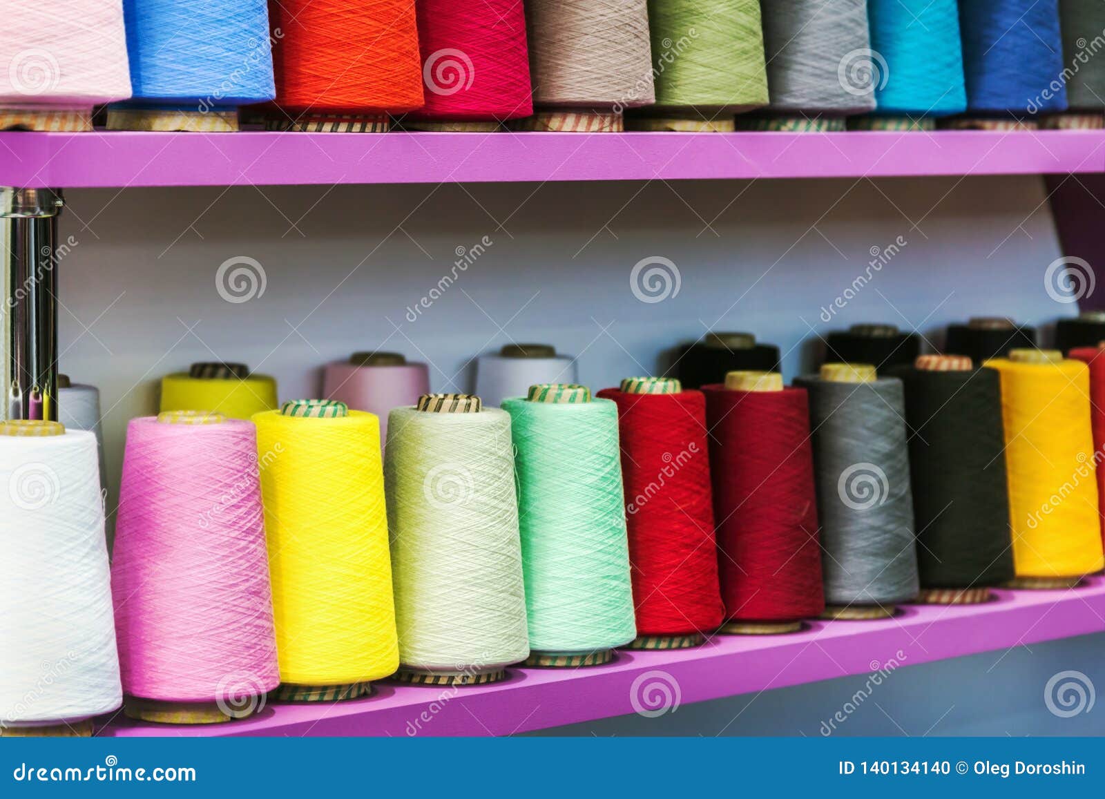 Different Color Spools of Thread for the Textile Industry Stock Photo ...