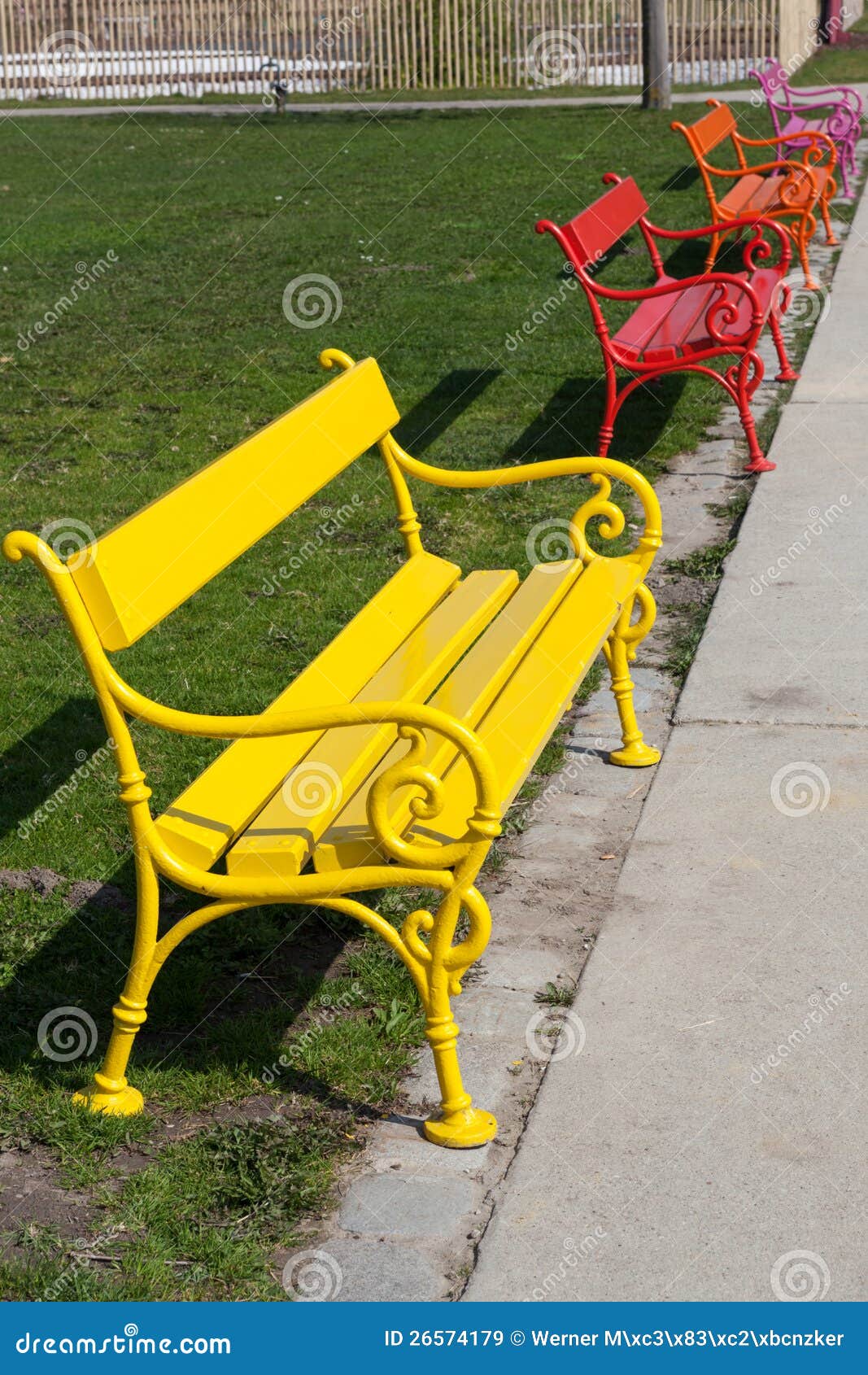 Different colored benches stock image. Image of plant - 26574179