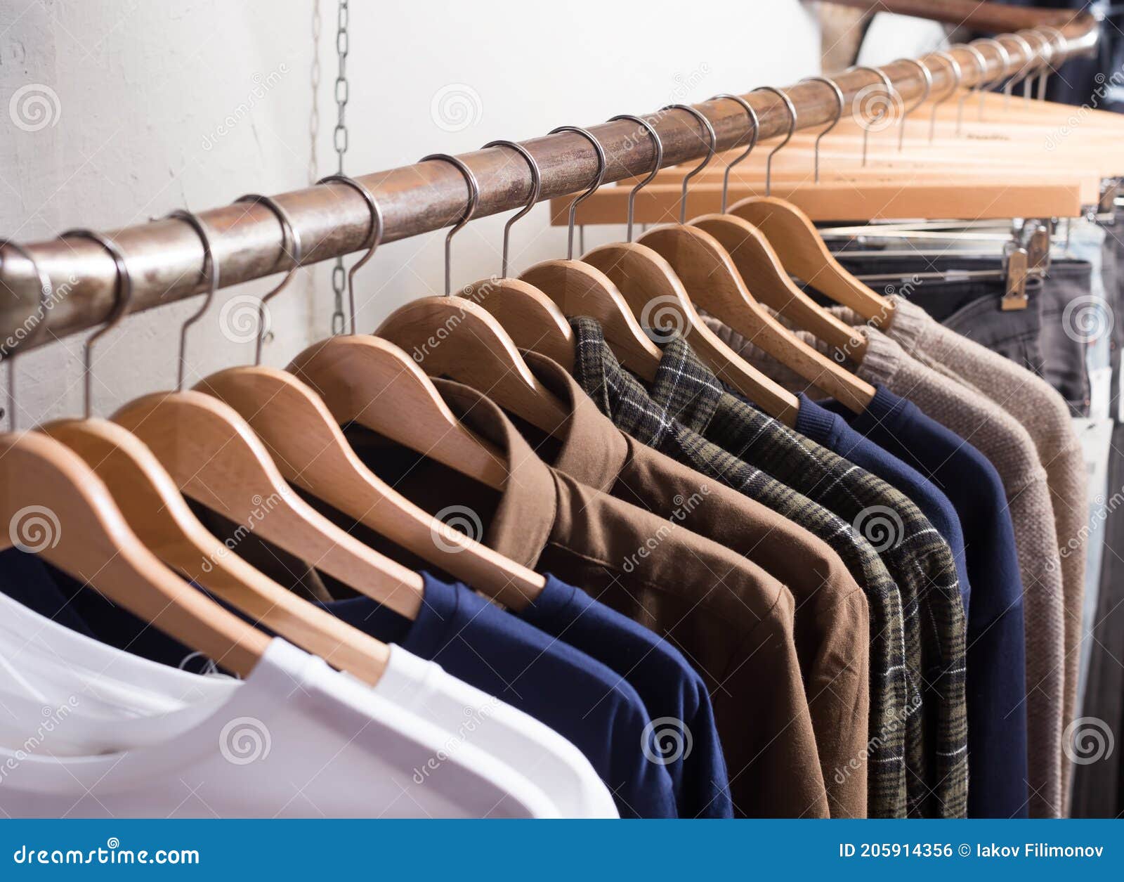 Different Colored Clothes in the Modern Shop Stock Photo - Image of ...