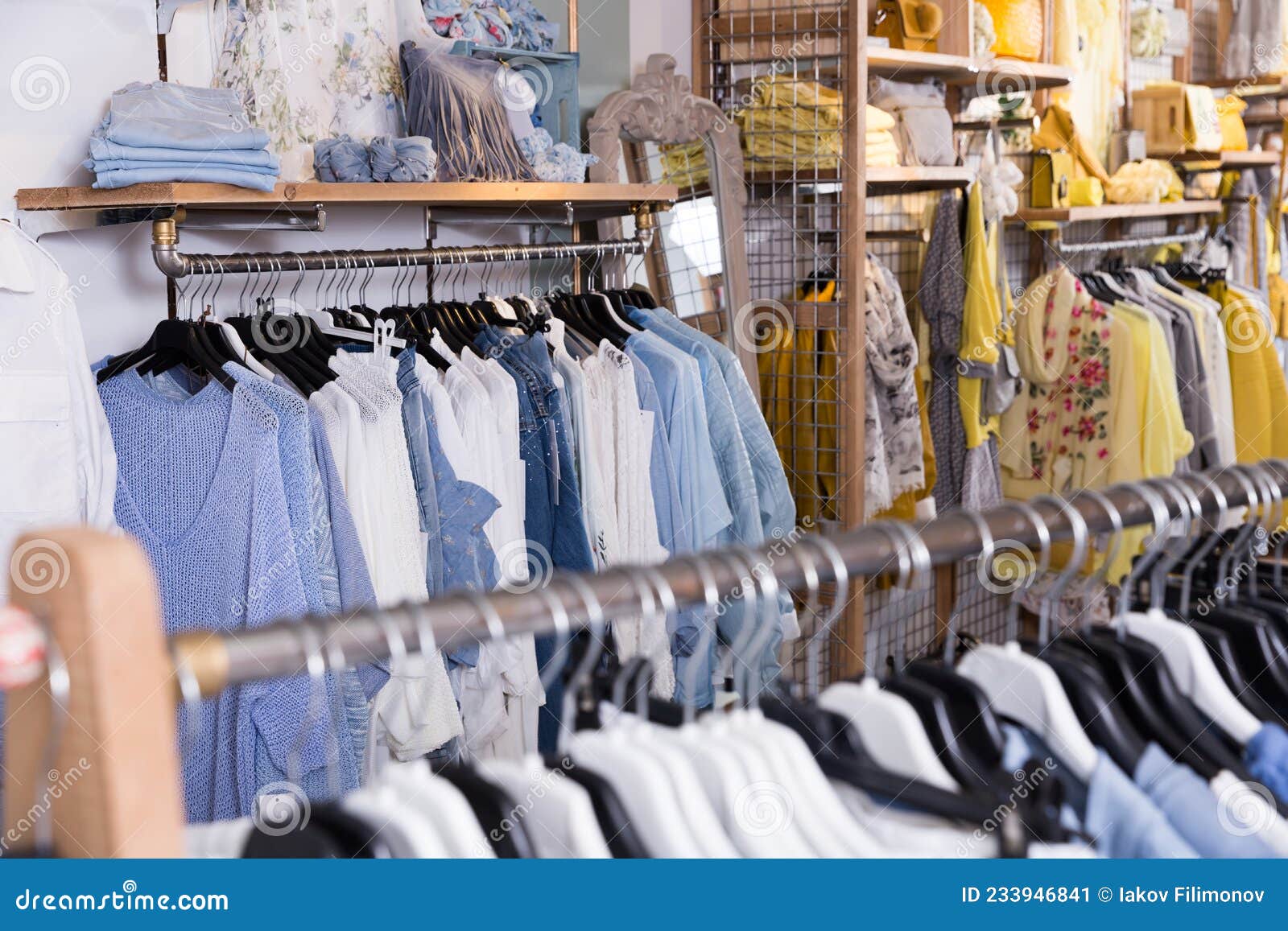 Different Colored Clothes in the Modern Shopping Centre Stock Image ...