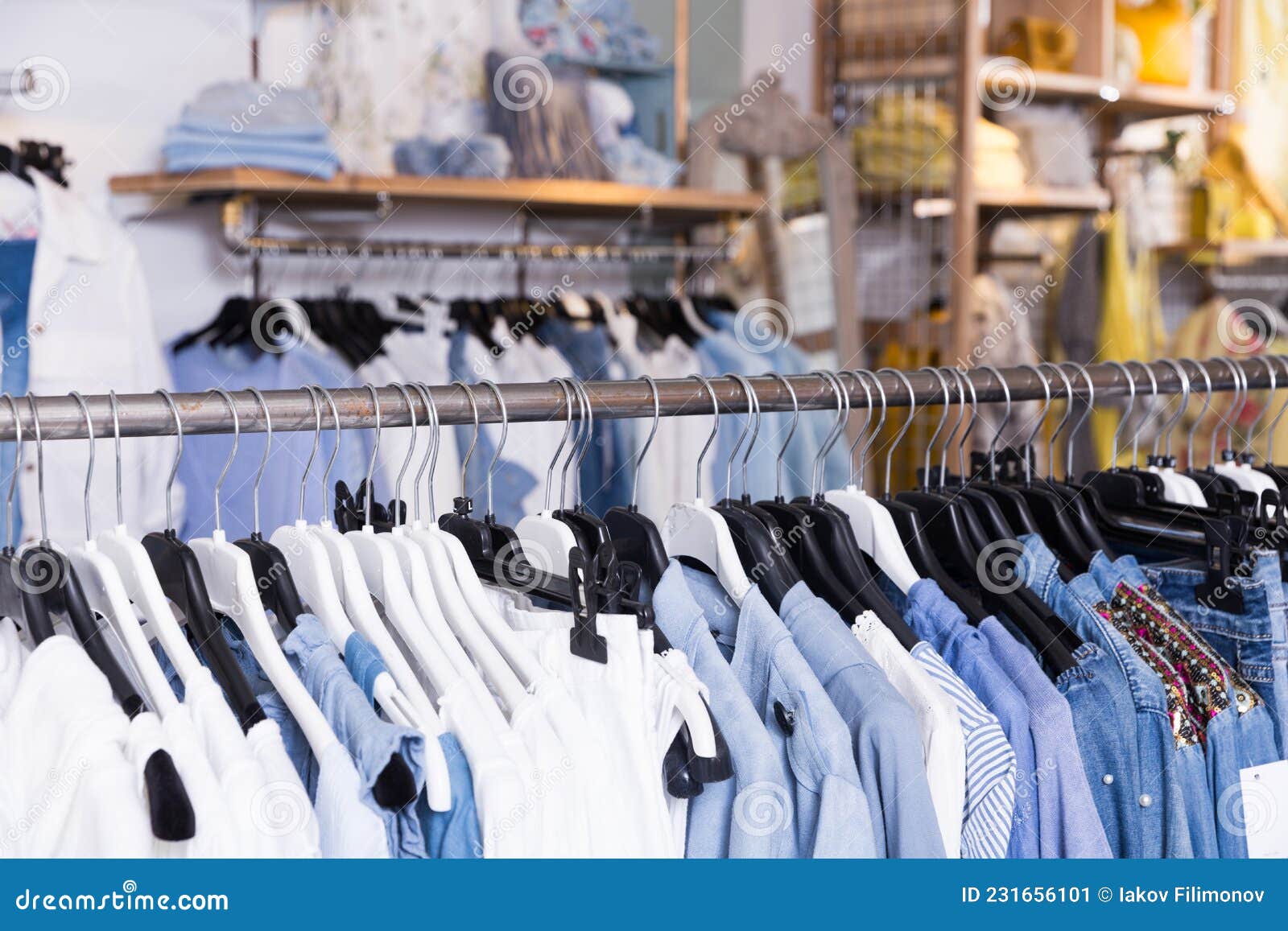 Different Colored Clothes in the Modern Shopping Centre Stock Image ...