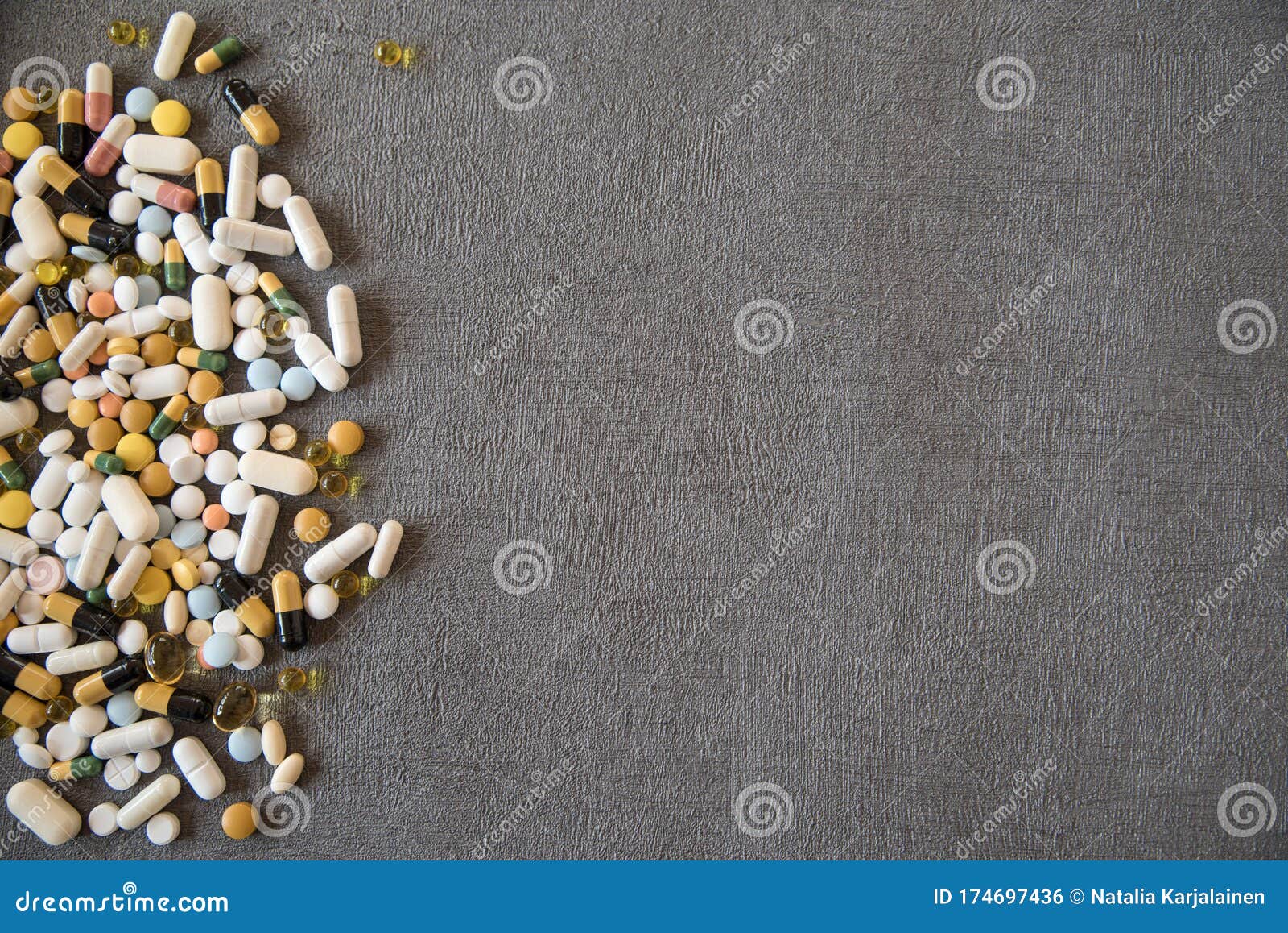 Different Colored Medications and Tablets on Grey Texture Background ...