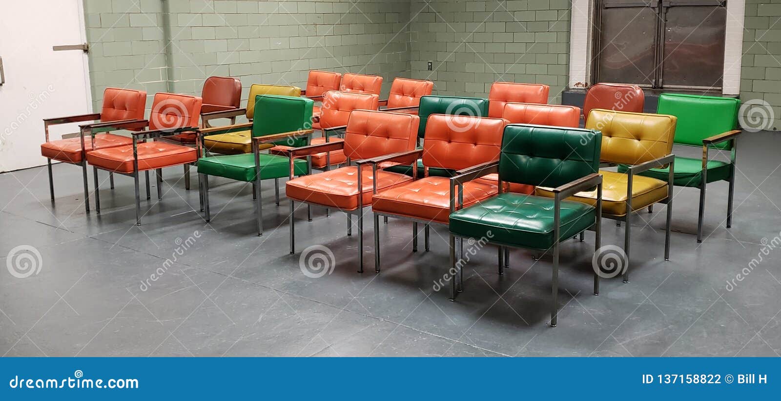 Different Colored Padded Chairs in Rows Stock Photo - Image of meeting ...