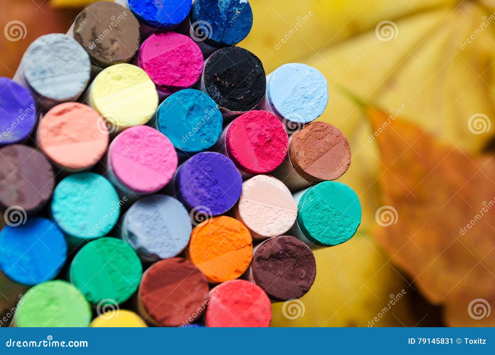 Different Colored Pastel Chalks on Background of Autumn Leaves Stock ...