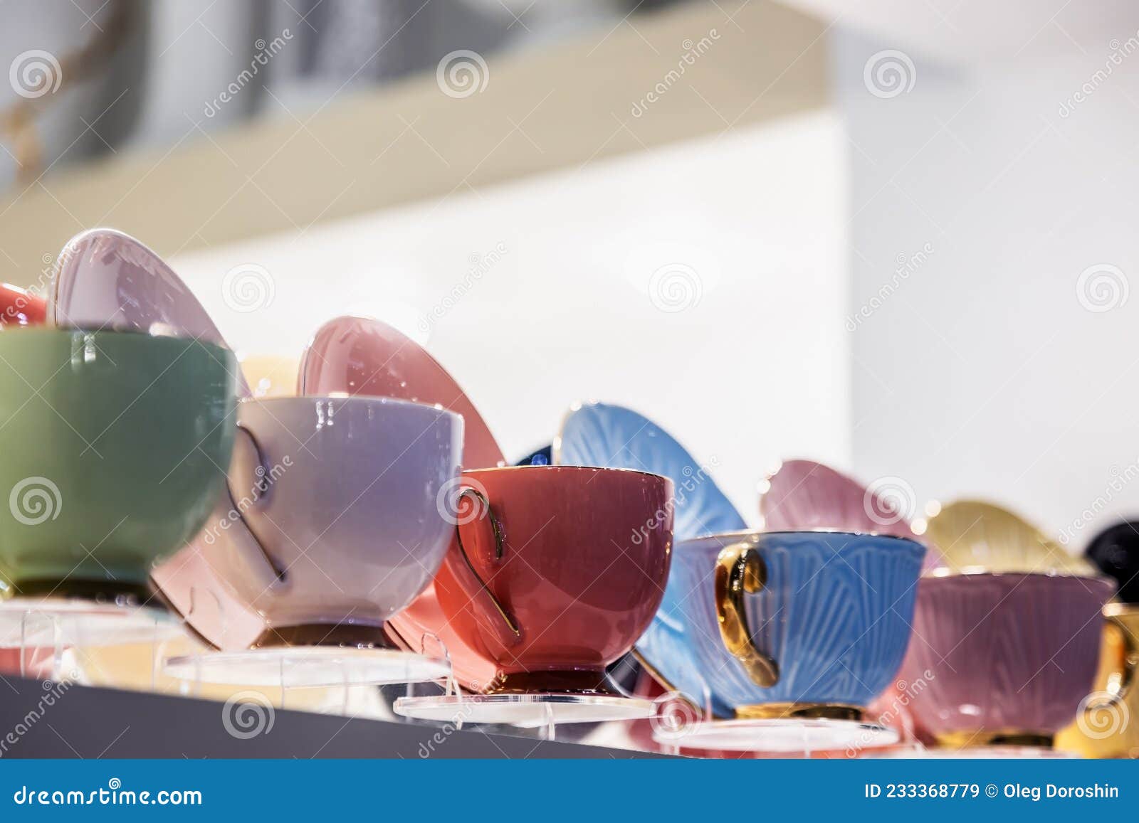 Different-colored Porcelain Cups are on the Counter Stock Image - Image ...