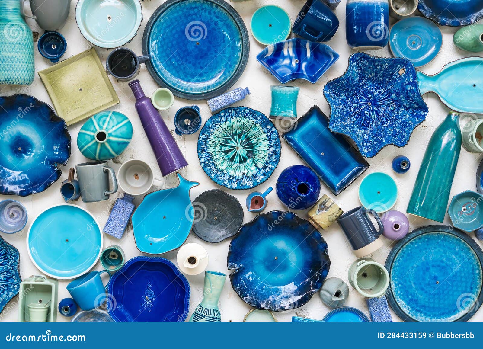 Different Colorful Ceramic Plates on the Wall Stock Image - Image of ...