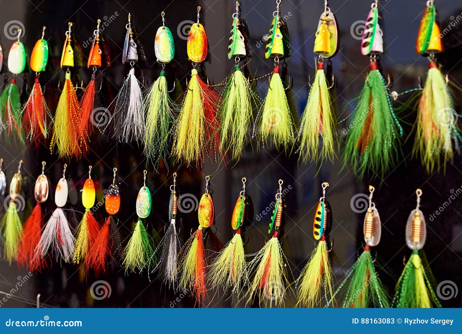 Different Colorful Fishing Baits on Black Stock Image - Image of group ...