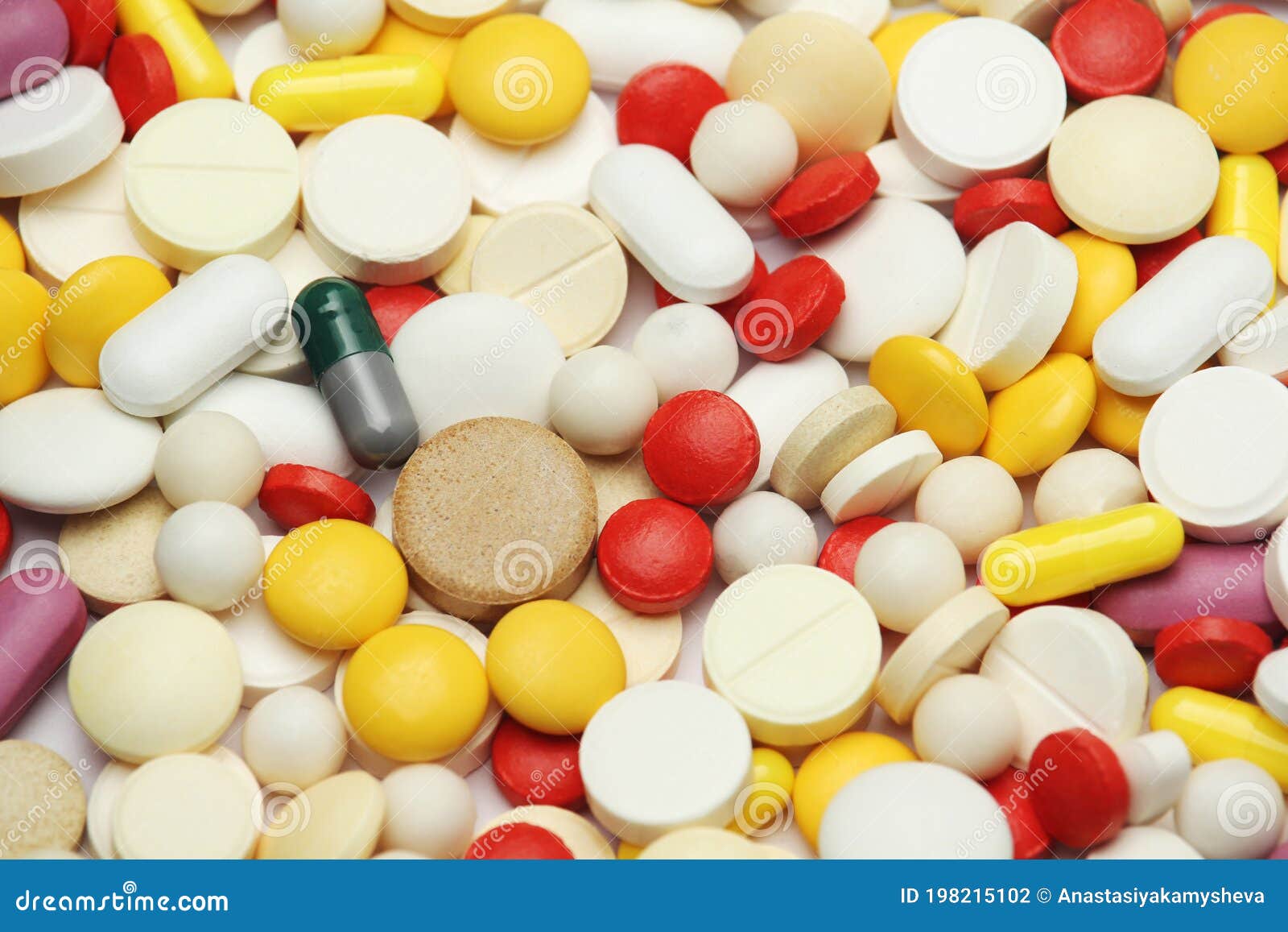 Different Colorful Tablets at White Background Stock Photo - Image of ...