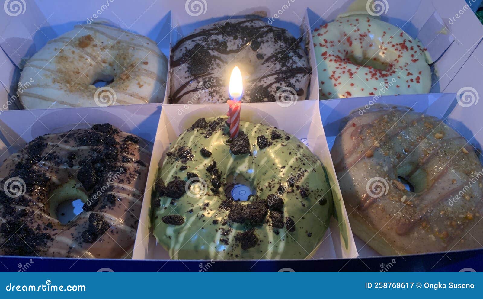 Different colors of donuts stock image. Image of sweetness - 258768617