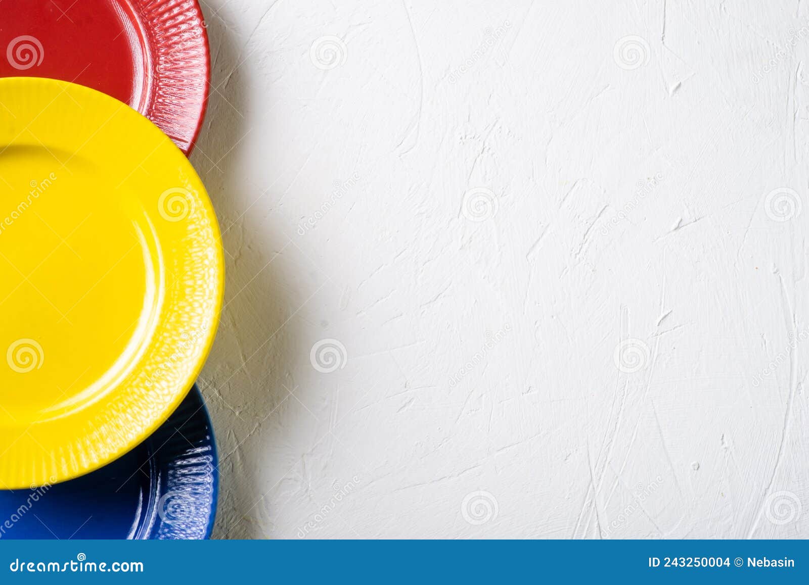 Different Colors of Empty Plates. White Background. Red, Blue and ...
