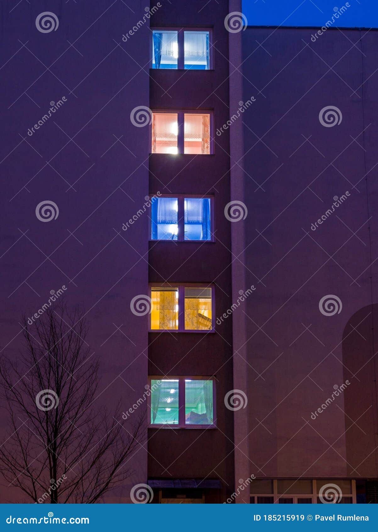 Different Colors of Lights in the Windows of the Building in the Early ...