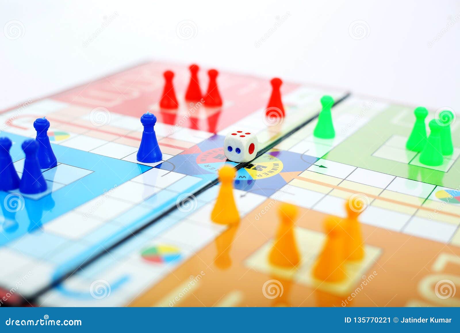 Different Colors Ludo Tokens and Dice on the Ludo Game Stock Image ...