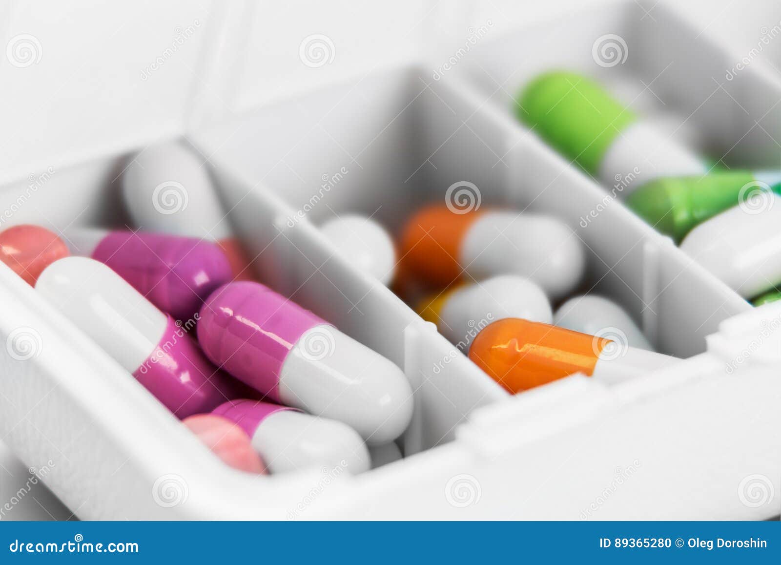 Different Colors of the Pill in a Plastic Box Stock Photo - Image of ...
