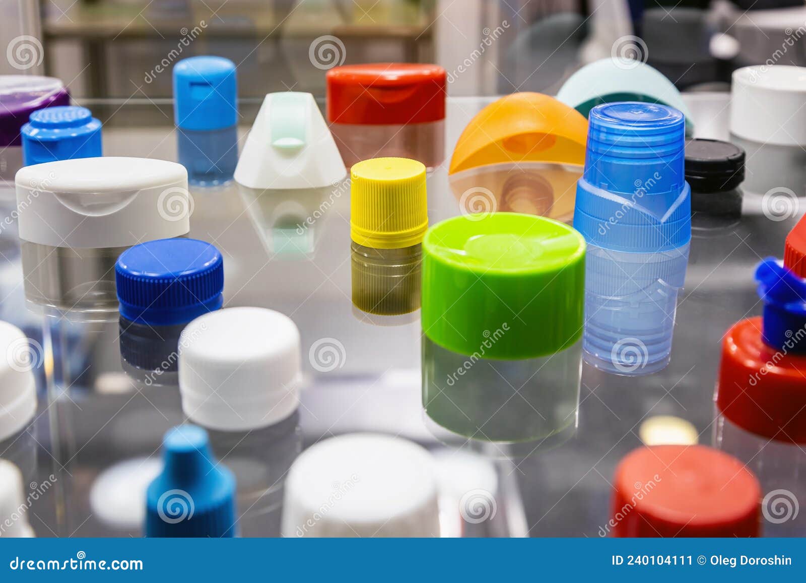 Different Colors of Plastic Lids and Containers of Different Shapes and ...