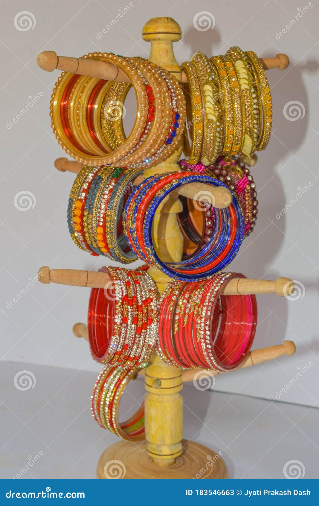 Different Colours of Glass & Metal Bangles on the Stand. Stock Image ...