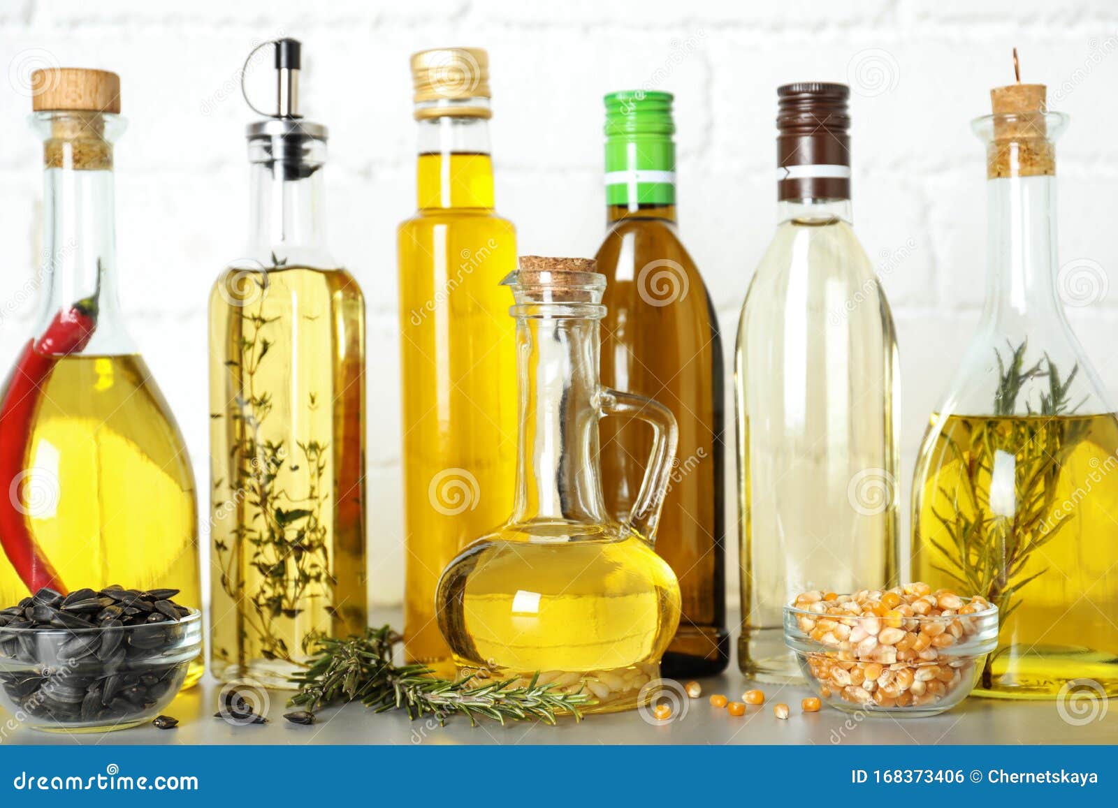 Different Cooking Oils in Bottles on Table Stock Photo - Image of thyme ...