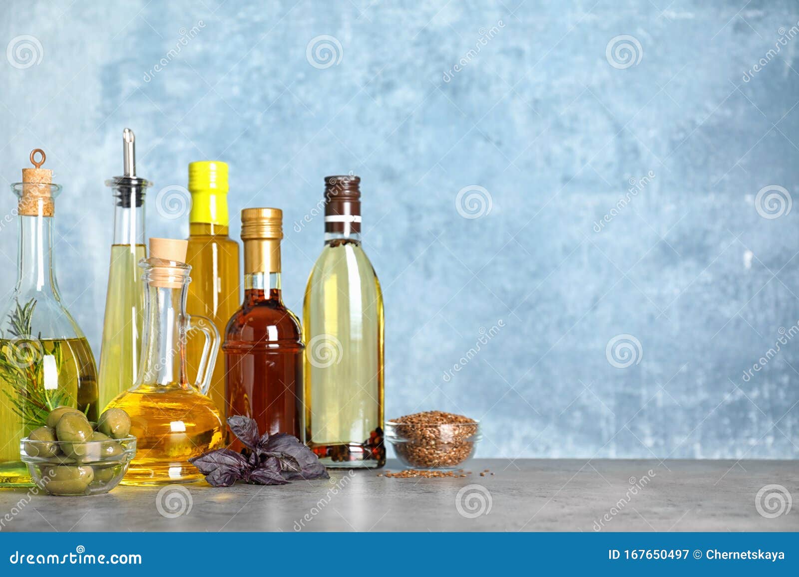 Different Cooking Oils on Table. Space for Text Stock Image - Image of ...