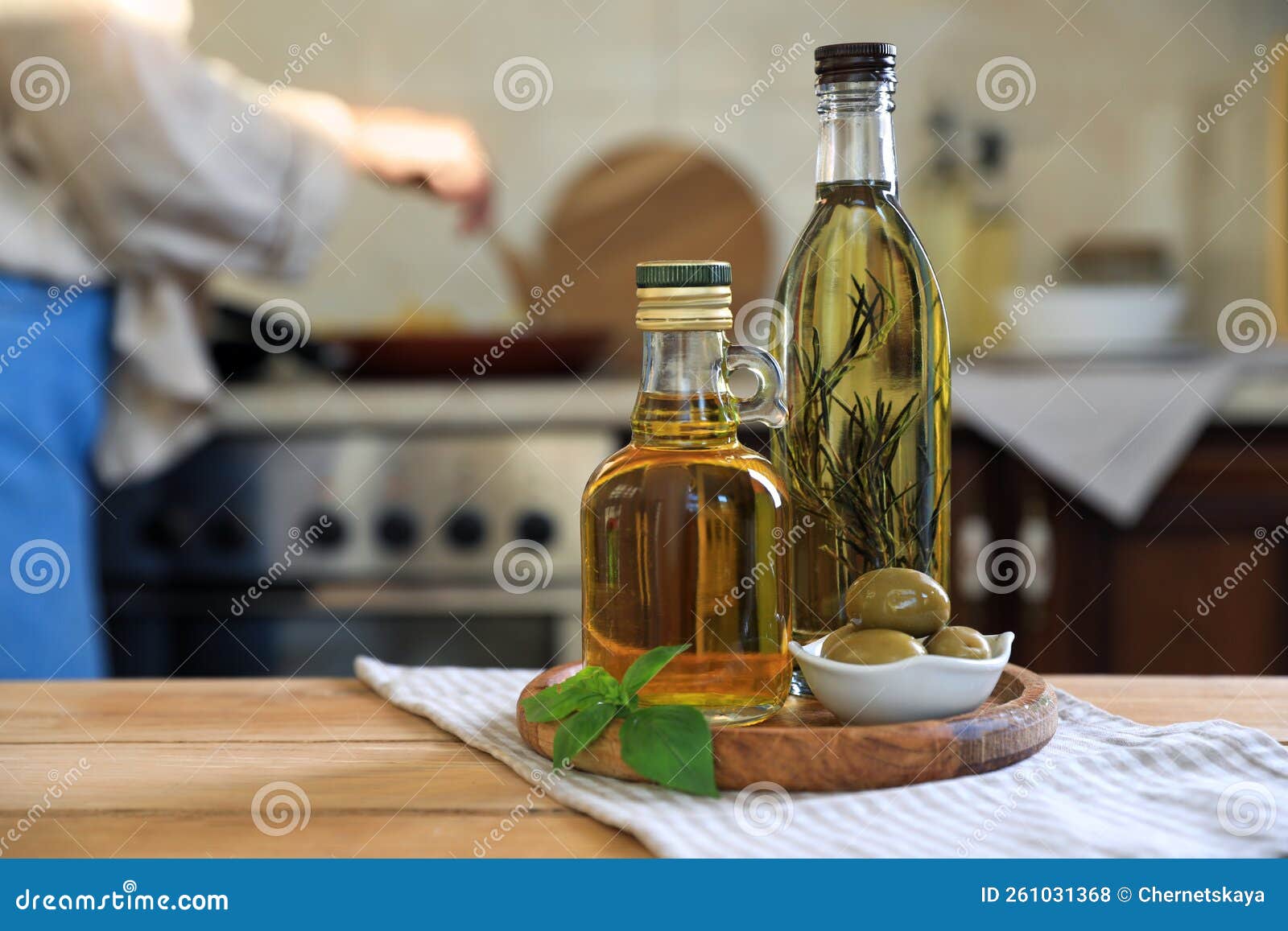 Different Cooking Oils and Ingredients on Wooden Table Indoors. Space ...