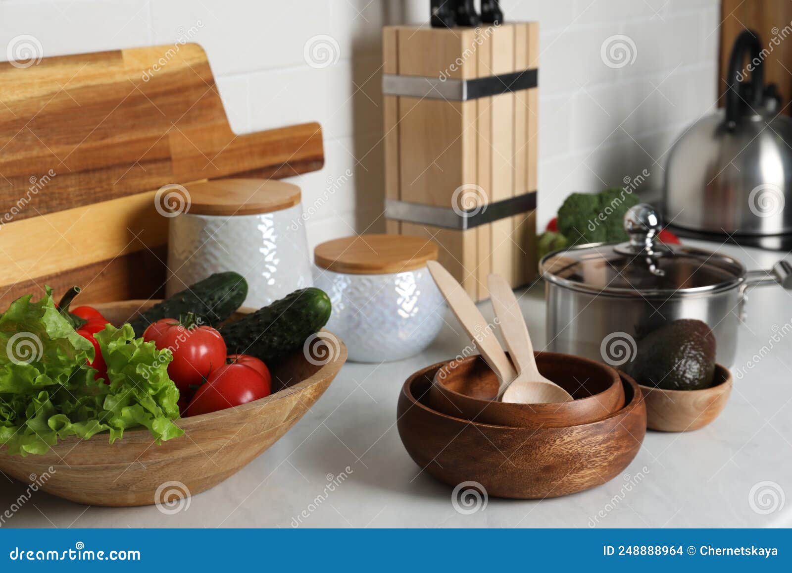 Different Cooking Utensils and Fresh Vegetables on Countertop in ...