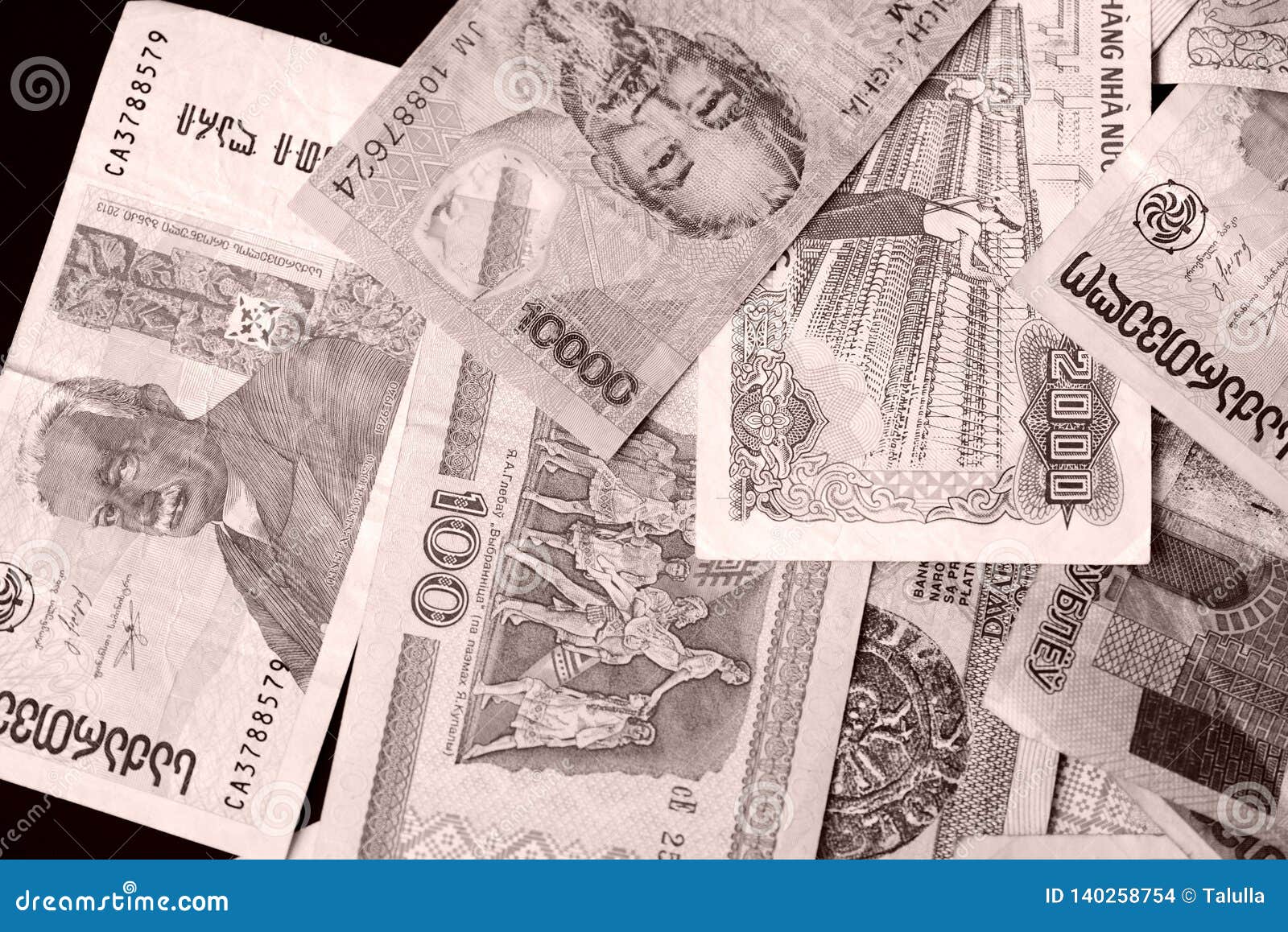 Different Countries Money Background. Brown Color Toned Stock Photo ...