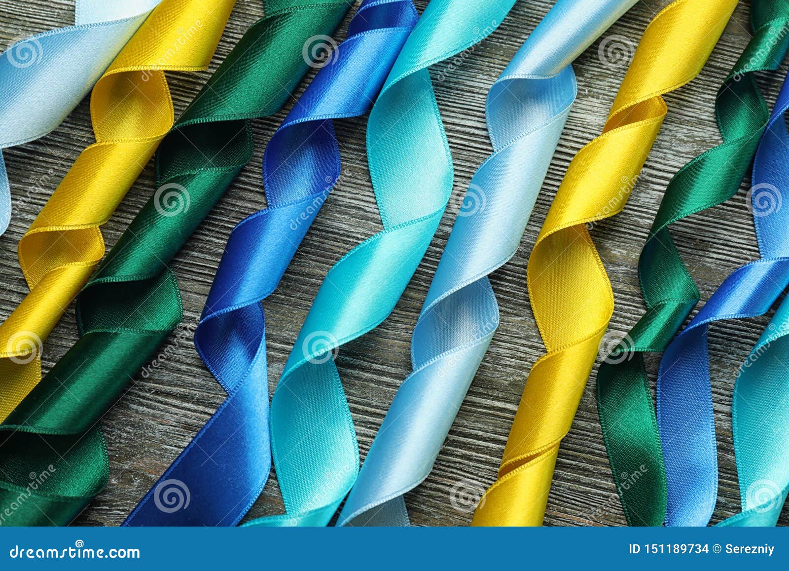 Different Curled Colorful Ribbons on Wooden Table Stock Photo - Image ...