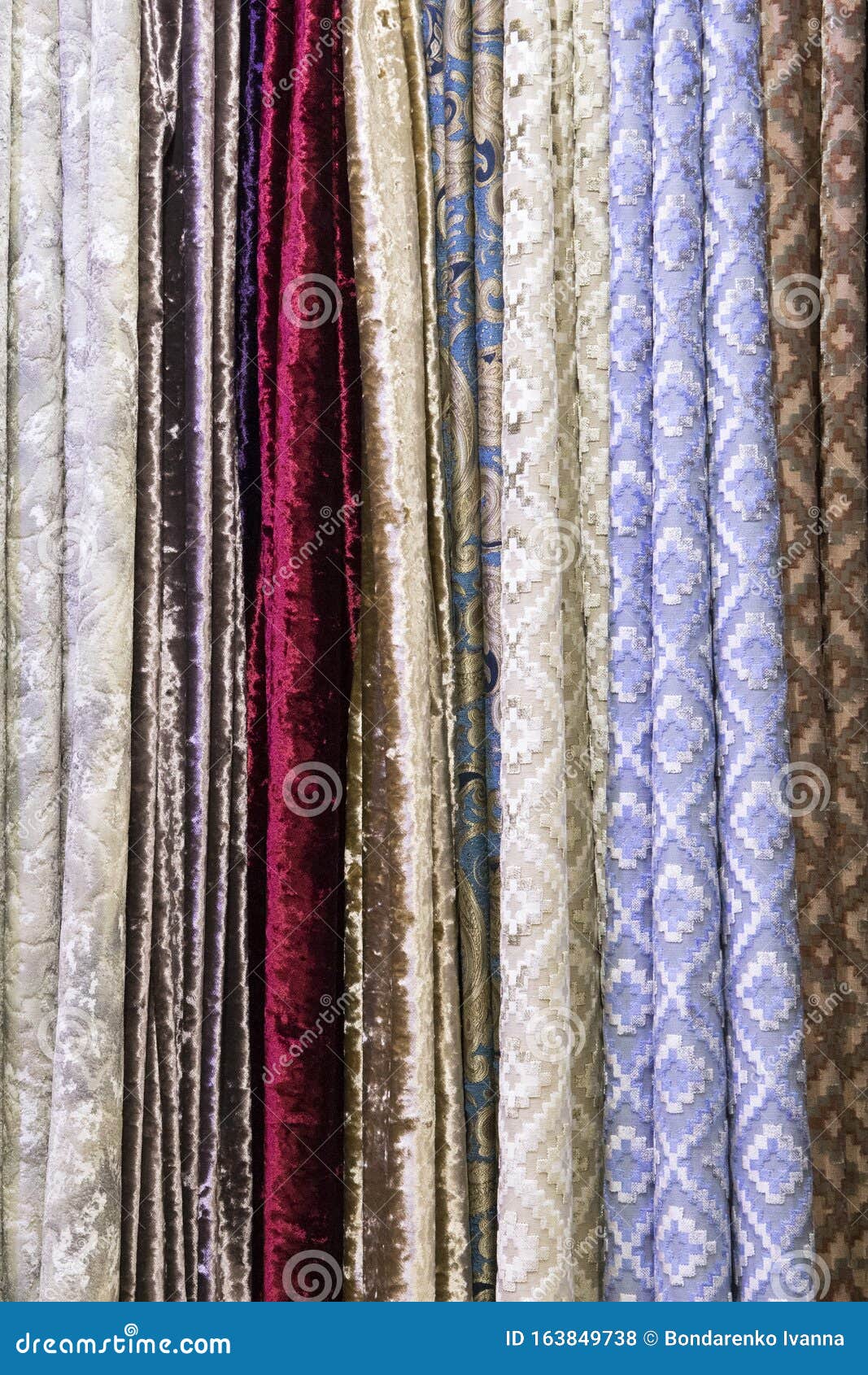 Different Curtains Fabric Samples Hanging in the Shop. Stock Photo ...