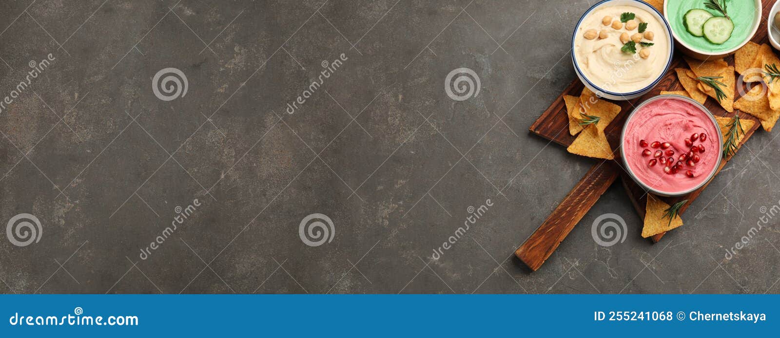 Different Delicious Hummuses and Tortilla Chips on Grey Table, Top View ...