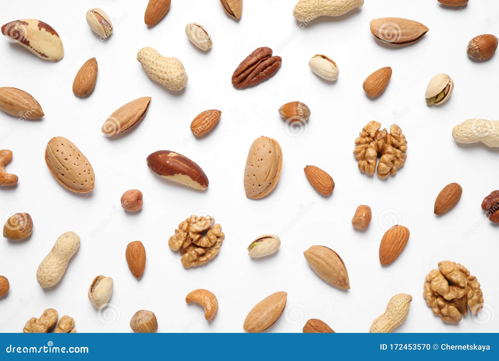Different Delicious Nuts on White Background Stock Photo - Image of ...