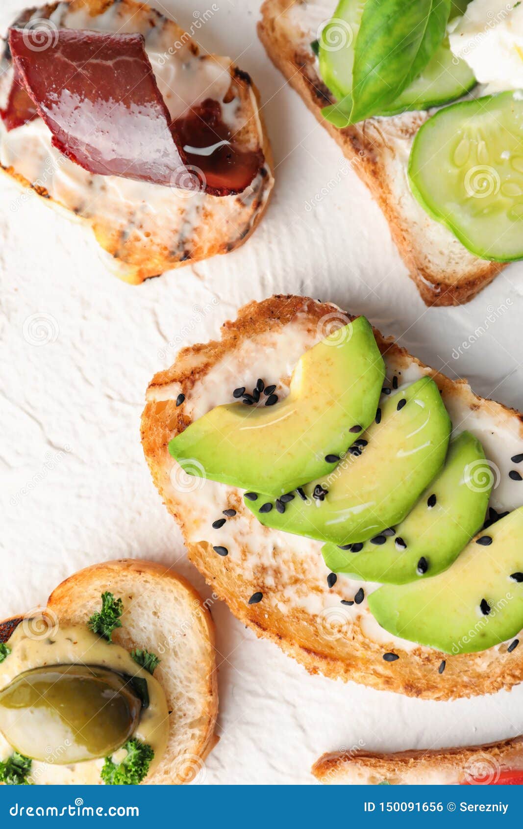 Different Delicious Toasts on Table Stock Photo - Image of toasted ...