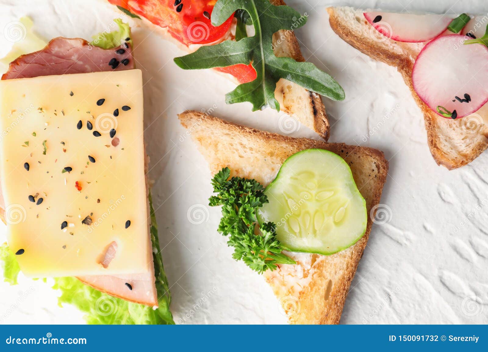 Different Delicious Toasts on Table Stock Photo - Image of crisp, food ...