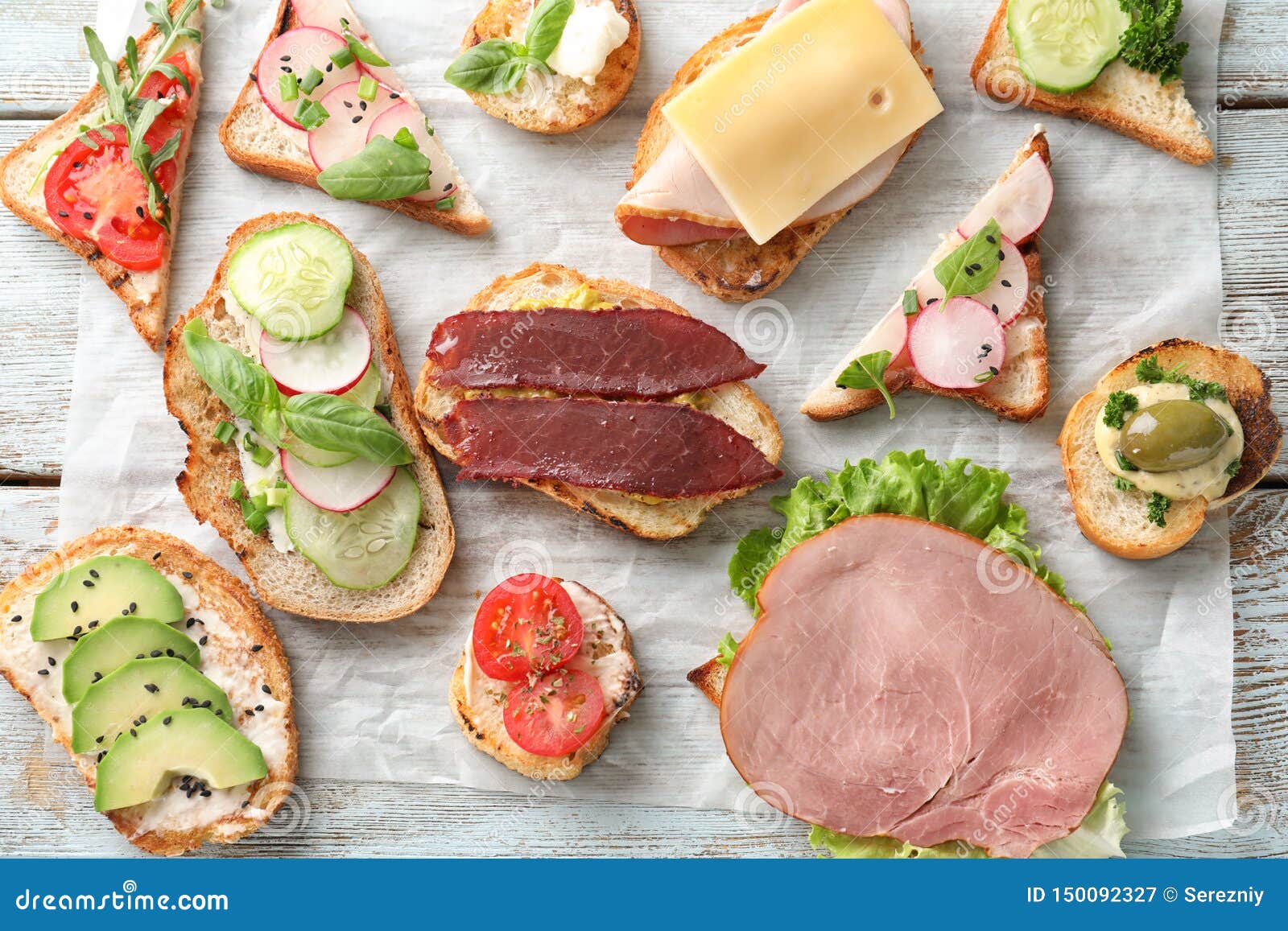 Different Delicious Toasts on Table Stock Image - Image of toasts ...