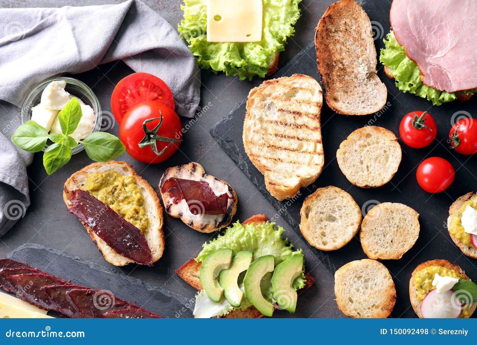 Different Delicious Toasts on Table Stock Photo - Image of food, fresh ...