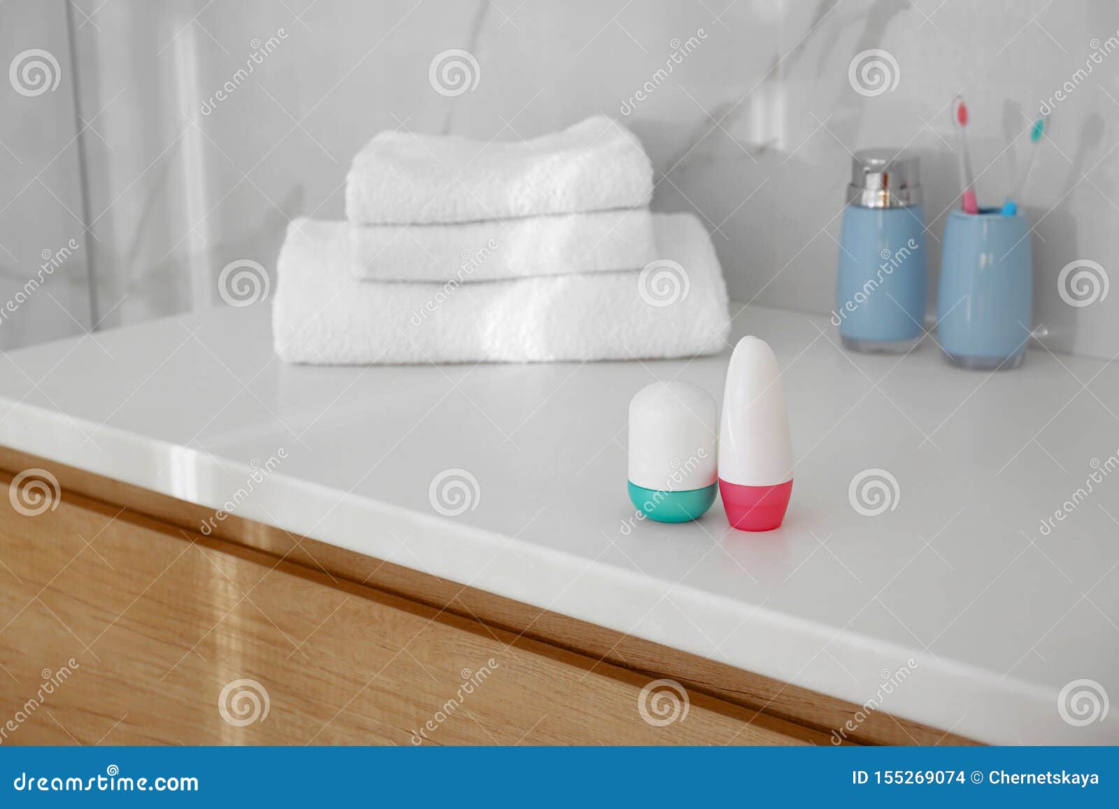 Different Deodorants on Light Countertop Stock Photo - Image of ...