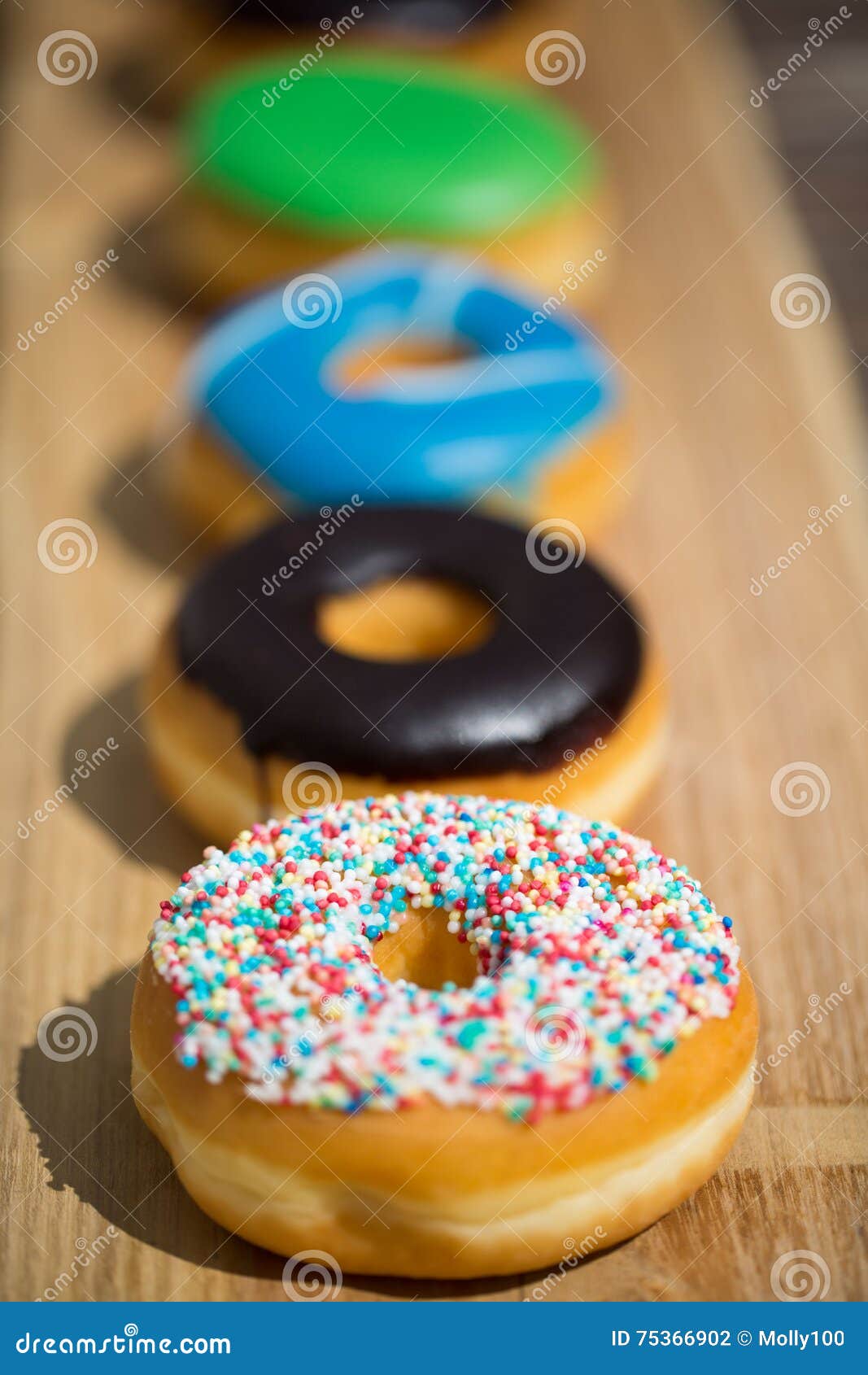 Different Donuts Behind the Other Stock Photo - Image of calories ...
