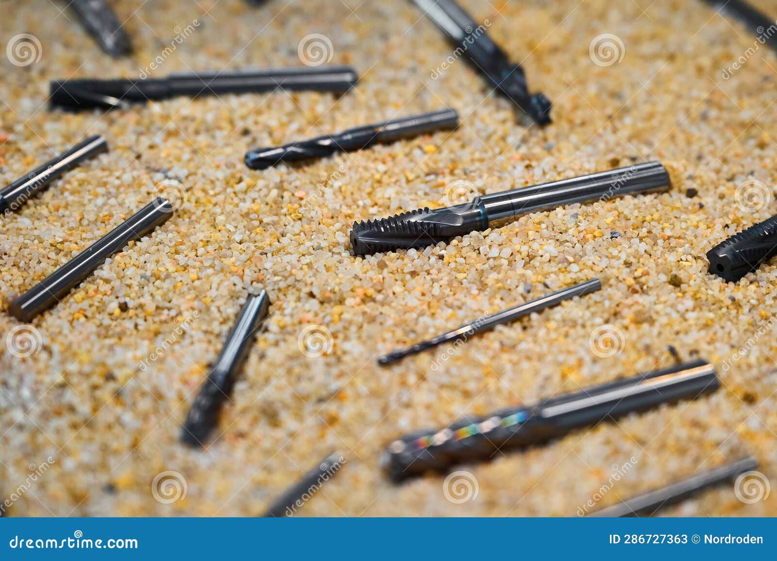 Different Drilling Tools on Sand Surface in Workshop Stock Image ...