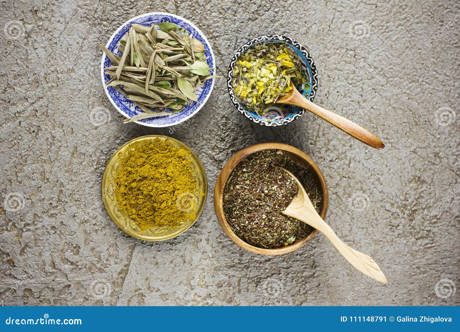 Different Dry Spices in Bowls on Concrete Background Stock Image ...