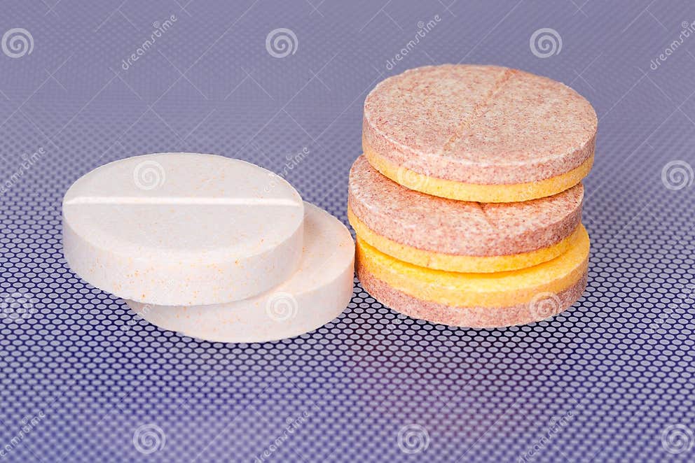 Effervescent Tablets on Blue Surface, Close-up in Selective Focus Stock ...